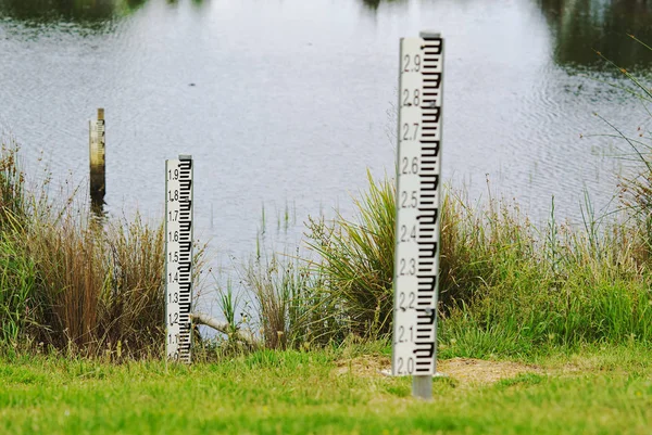 Water level of poles Stock Photos, Royalty Free Water level of poles ...