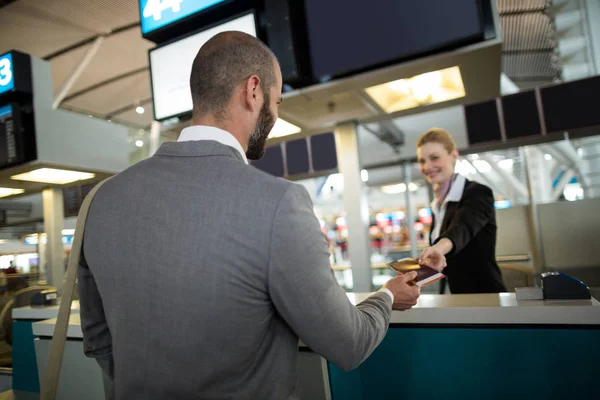 Airline check in assistant Stock Photos, Royalty Free Airline check in ...