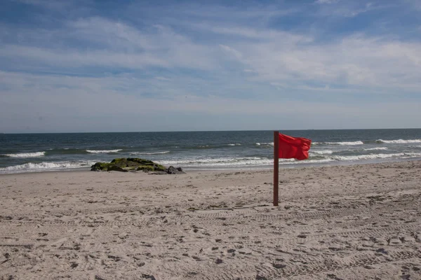Red flags beach Stock Photos, Royalty Free Red flags beach Images ...