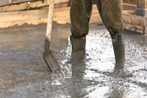 Man leveling concrete slab, working place — Stock Photo © zurijeta #6187390