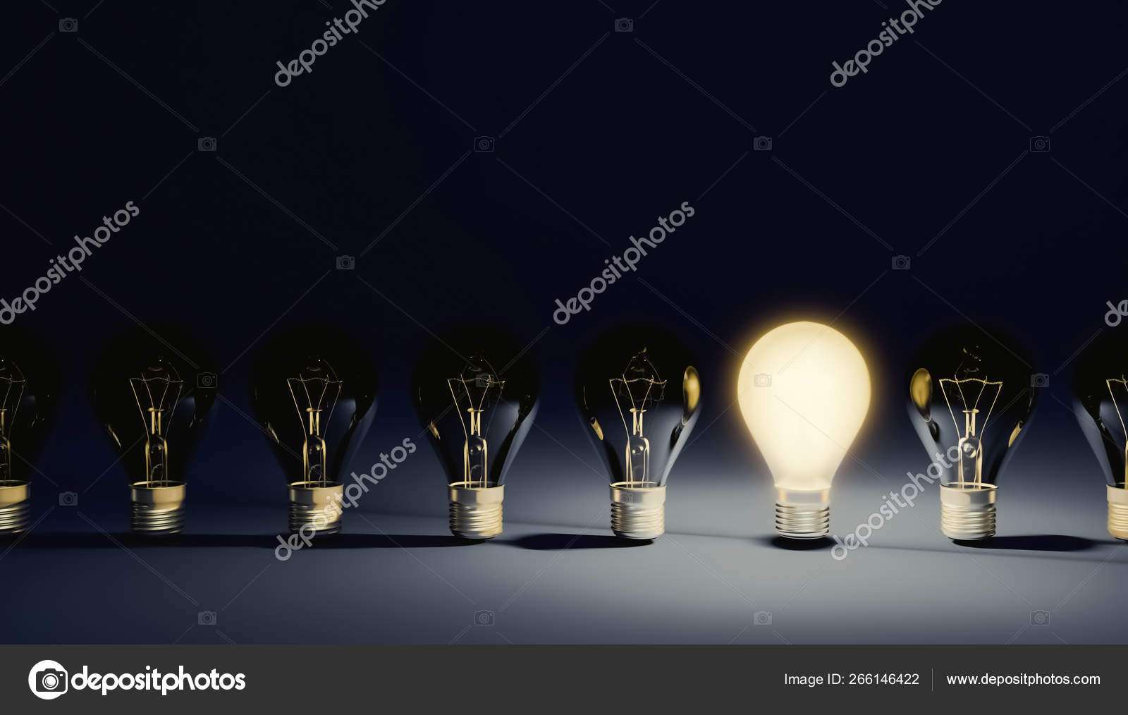 Row of switched off light bulbs with one lit on and shining. Idea ...