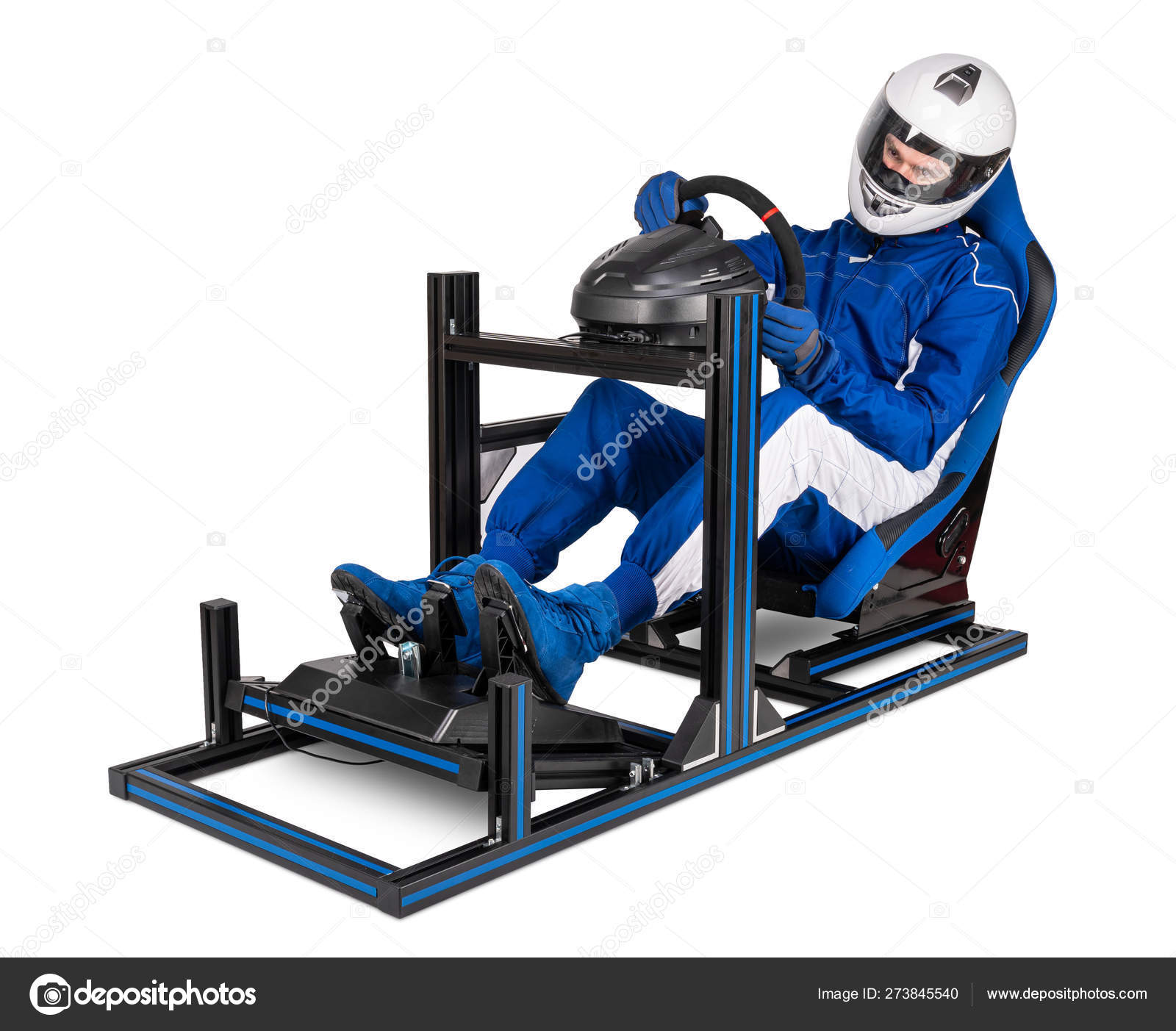 Race driver in blue overall with helmet training on simracing al Stock ...