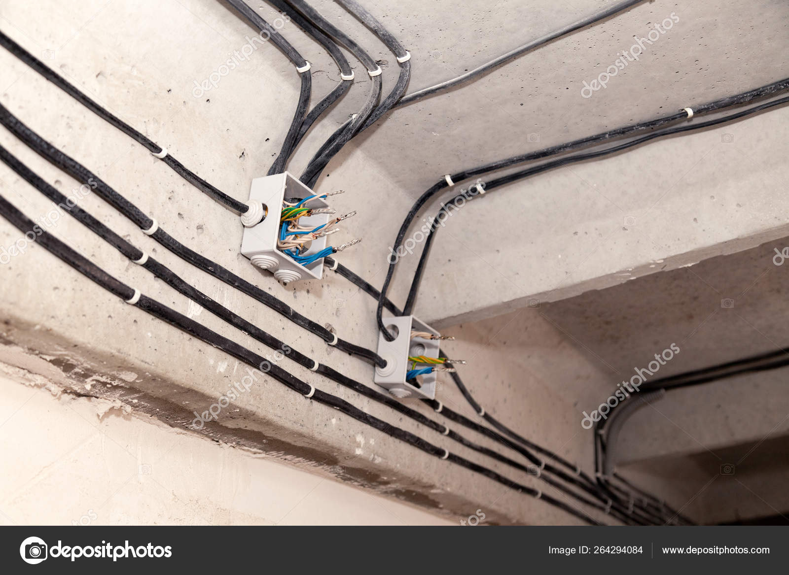 Cable laying ceiling. Electrical wires on wall. Wiring replacement ...