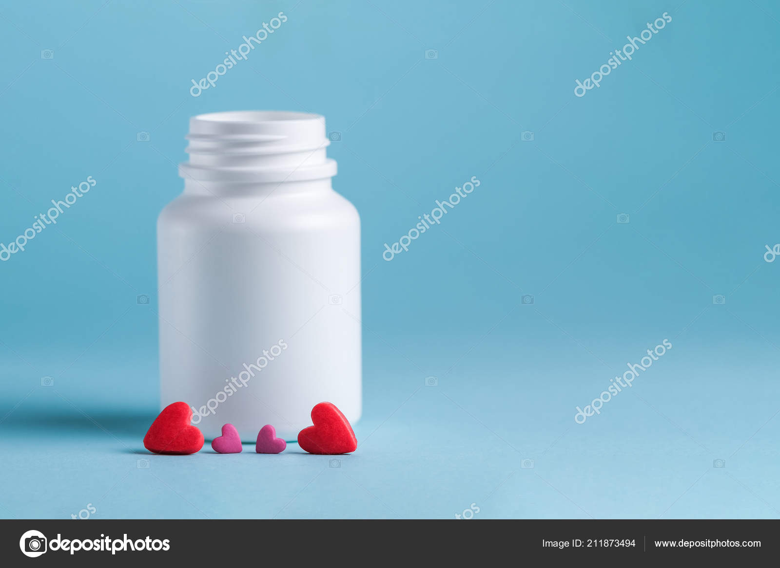 Tablets Form Heart Jar Tablets Blue Background Stock Photo by ©goffkein ...