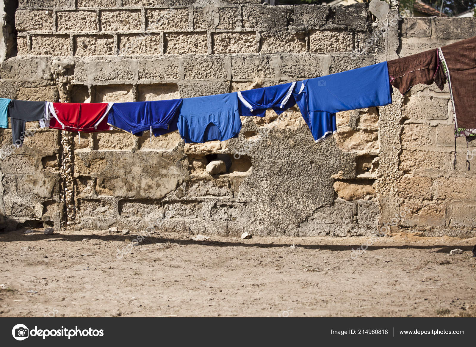 Clothes Drying Line Wiuth Wall Background Stock Photo by ...