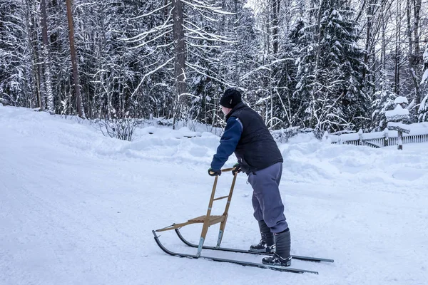 Man pushing sled Stock Photos, Royalty Free Man pushing sled Images ...