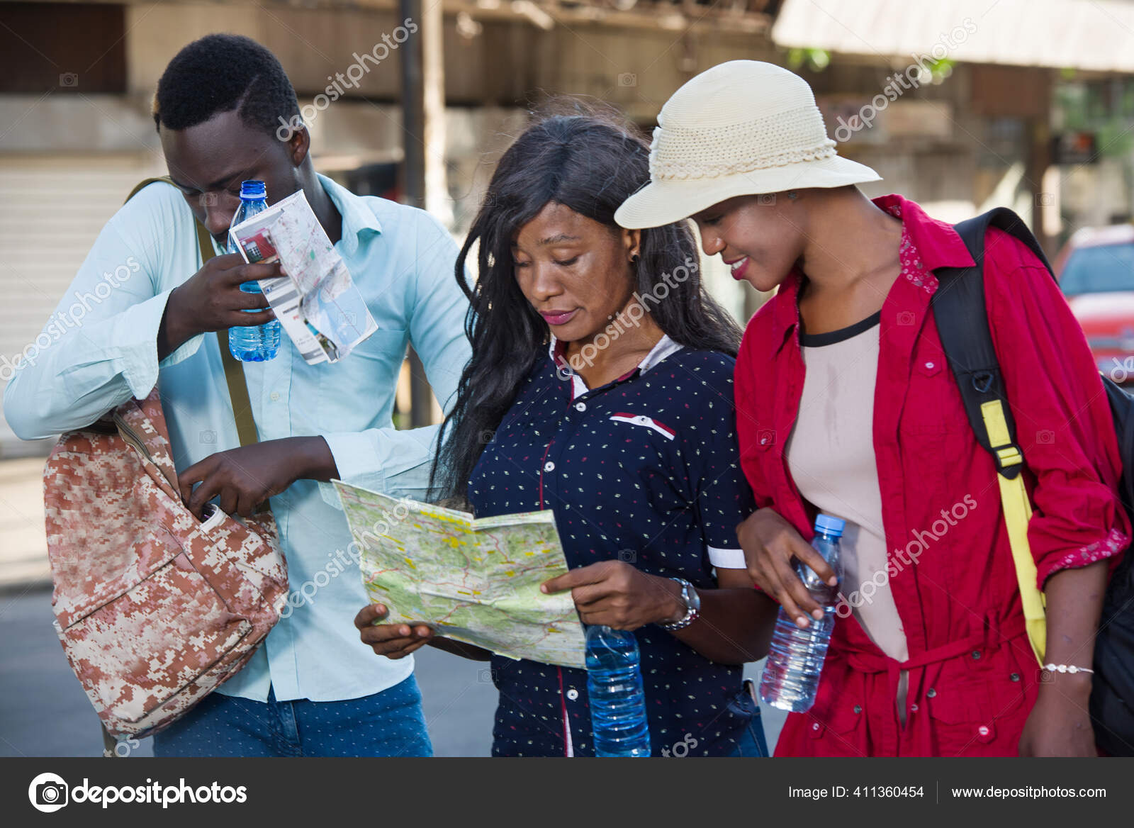 Group Young Tourists Standing Staring Map While Smiling — Stock Photo ...