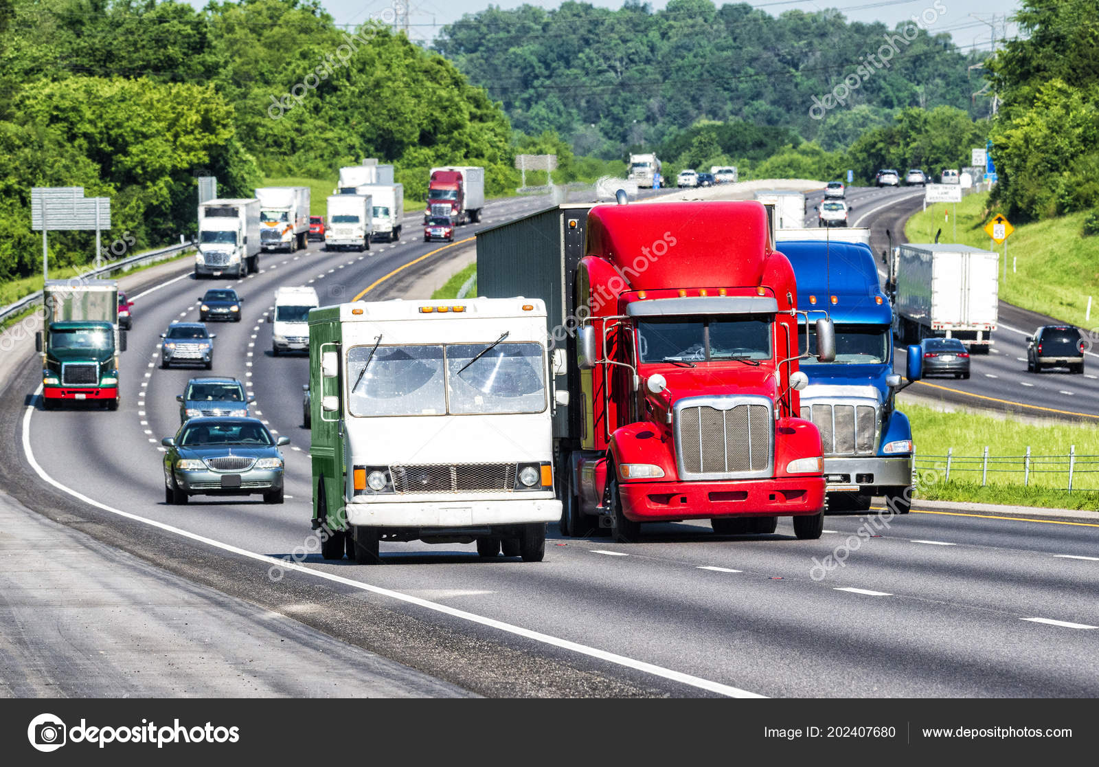 American Colors Reflect Three Trucks Leading Traffic Interstate Highway ...