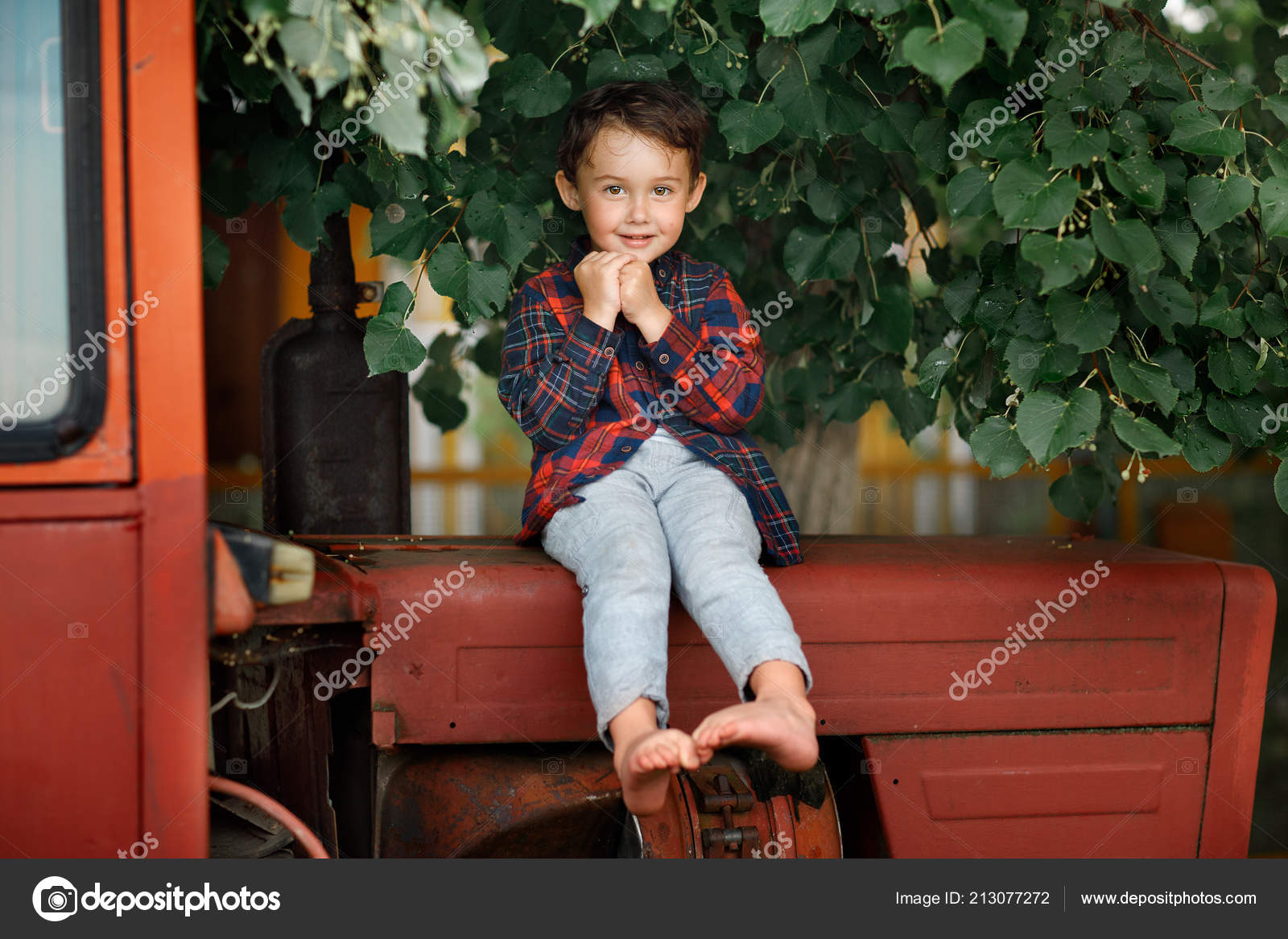 Cheerful Boy Sitting Tractor Smiling Camera Stock Photo by ©narapoport ...