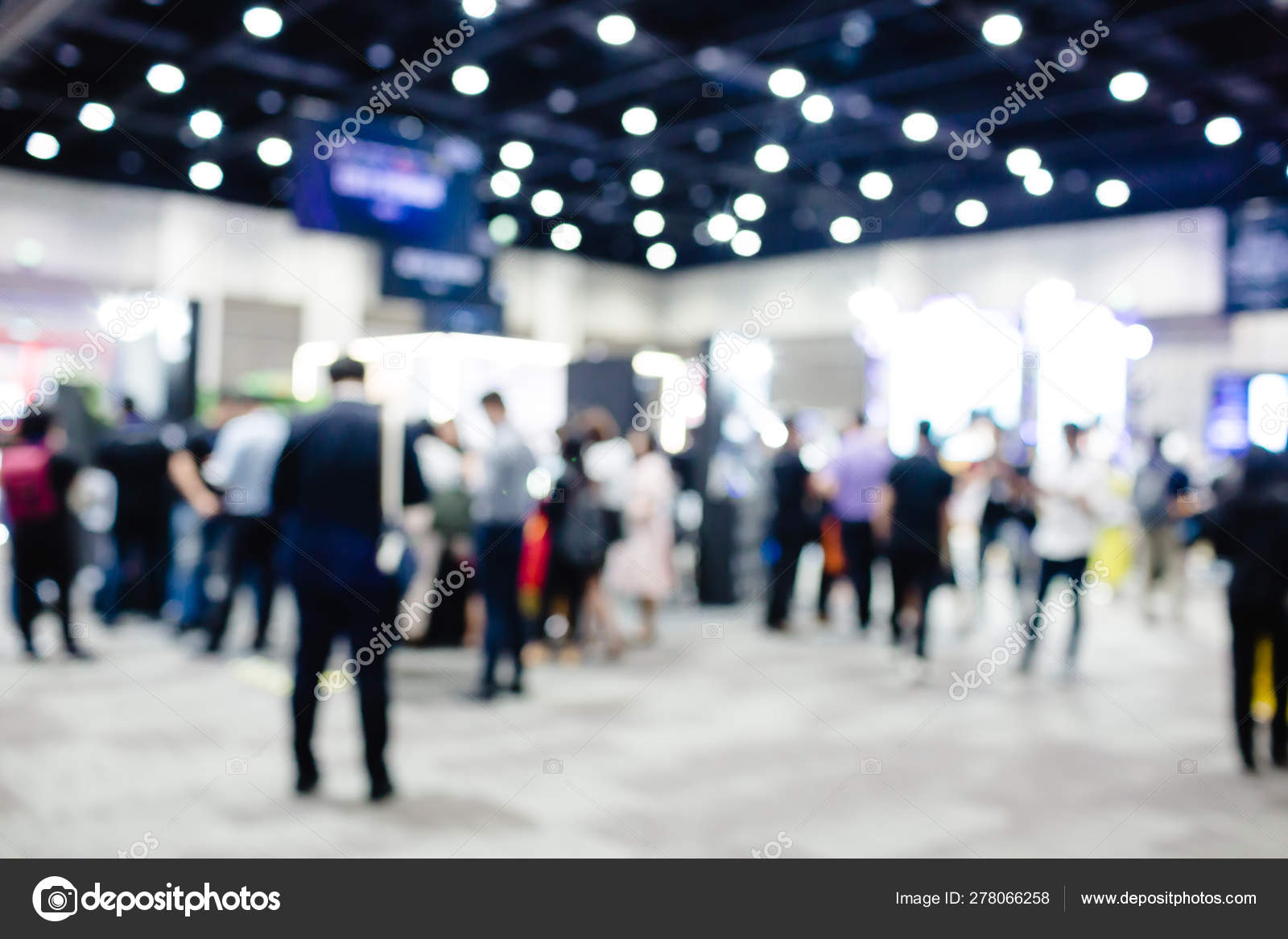 Blurred exhibition event in hall with many people on background. Stock ...