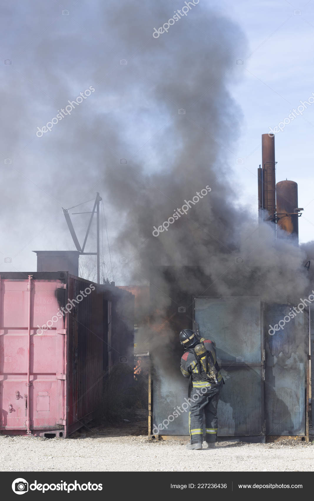 Firefighter Putting Out Fire Training Station Extinguisher Backdraft ...