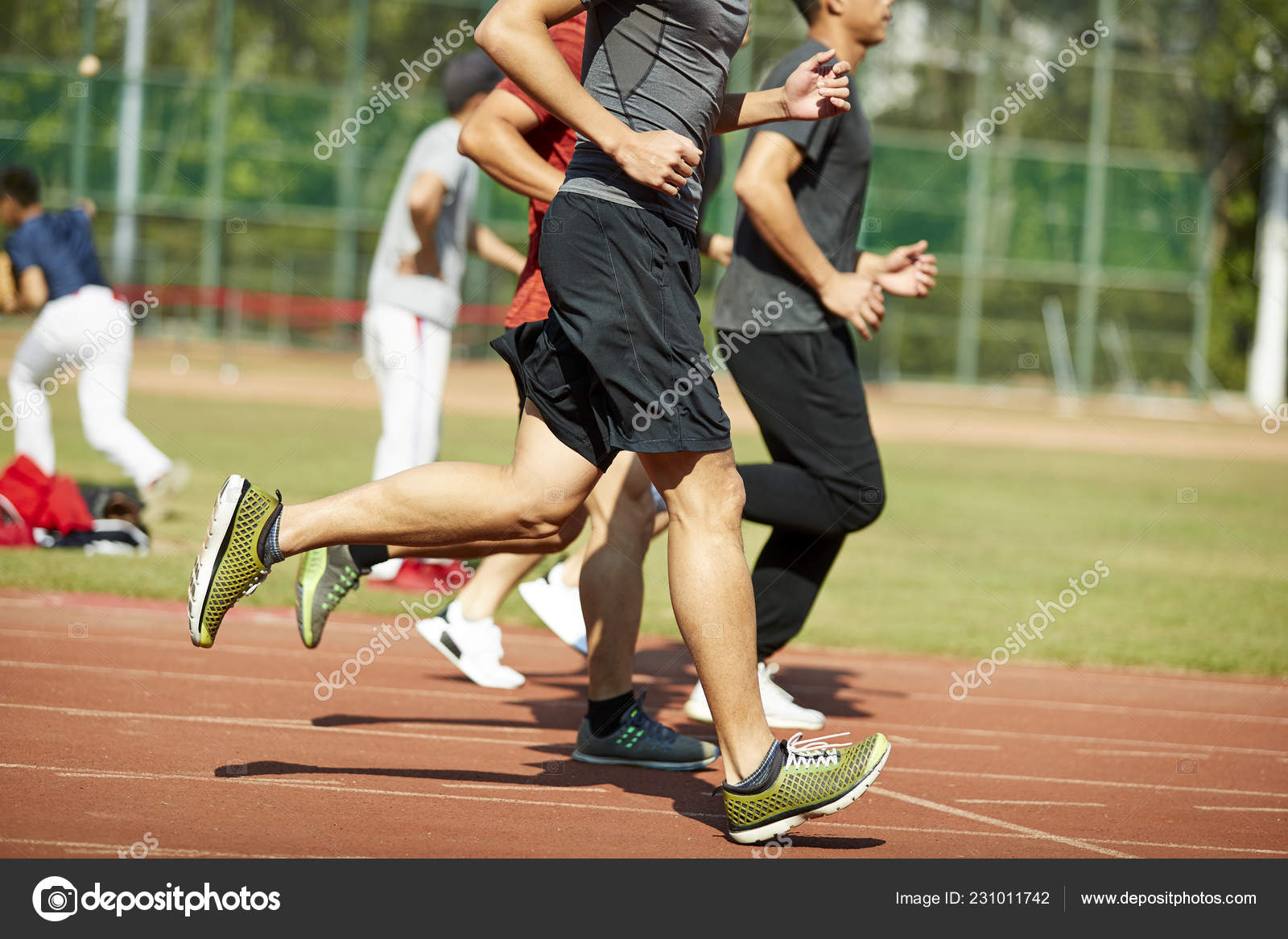 Four Young Asian Track Field Athletes Racing Competing Each Other Stock ...