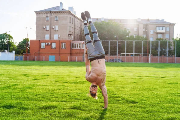 Man handstand Stock Photos, Royalty Free Man handstand Images ...