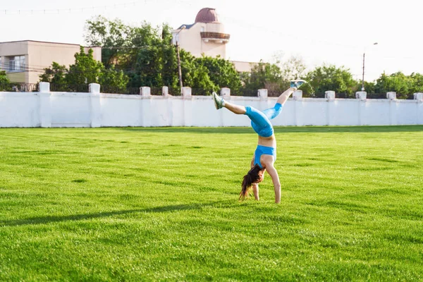Girl gymnast leaping Stock Photos, Royalty Free Girl gymnast leaping ...