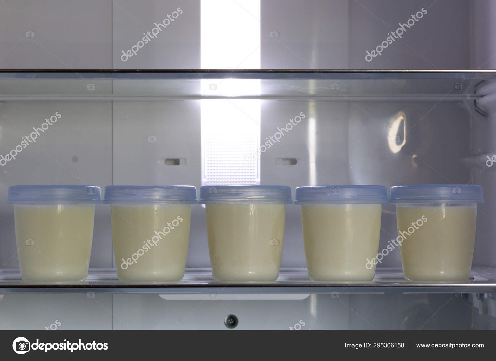 Breast milk storage stored in the back of refrigerator Stock Photo by ...