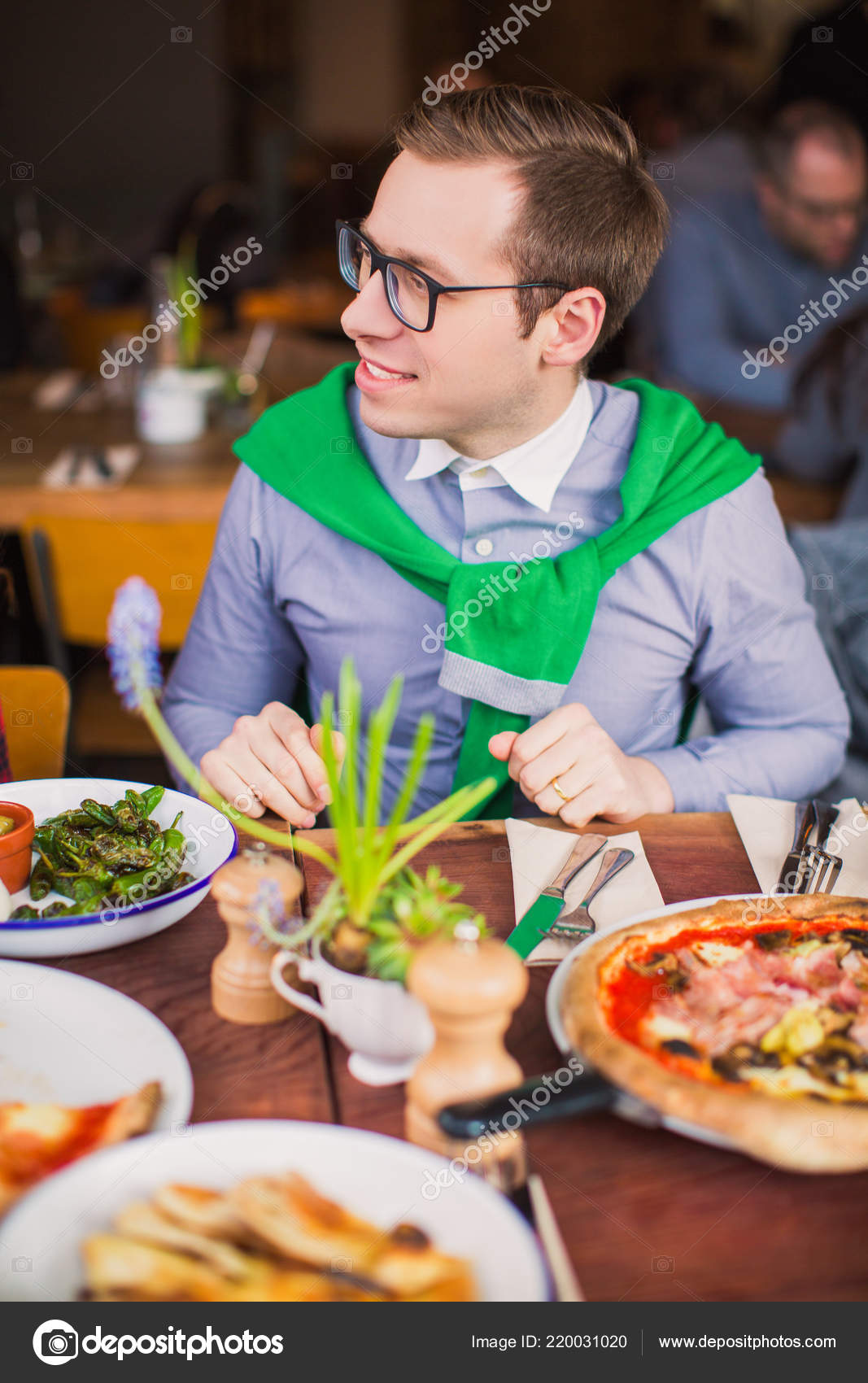 Handsome Man Sits Table Different Meal Looks Aside Restaurant Stock ...
