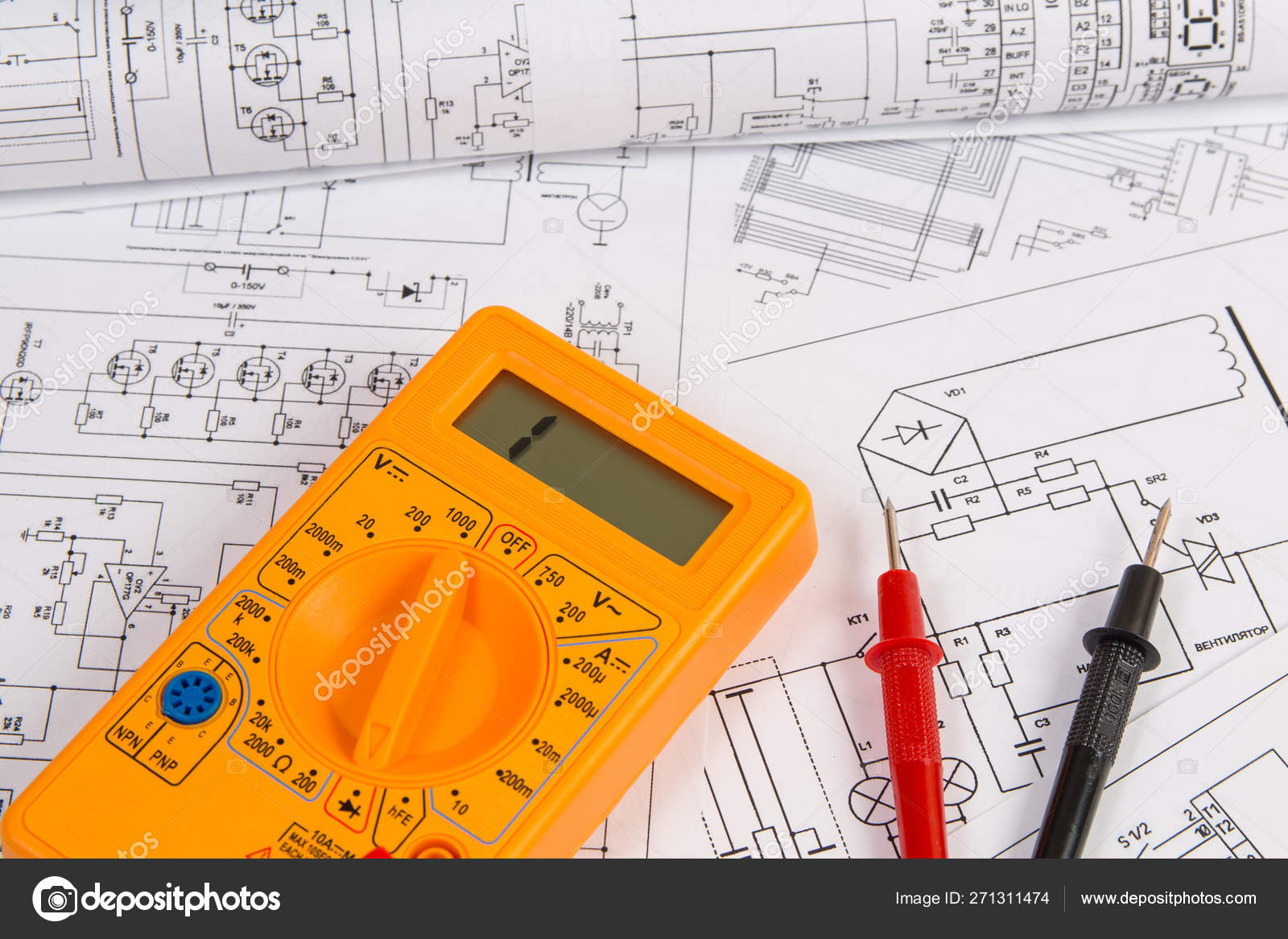 Electrical engineering drawings and digital multimeter. — Stock Photo ...