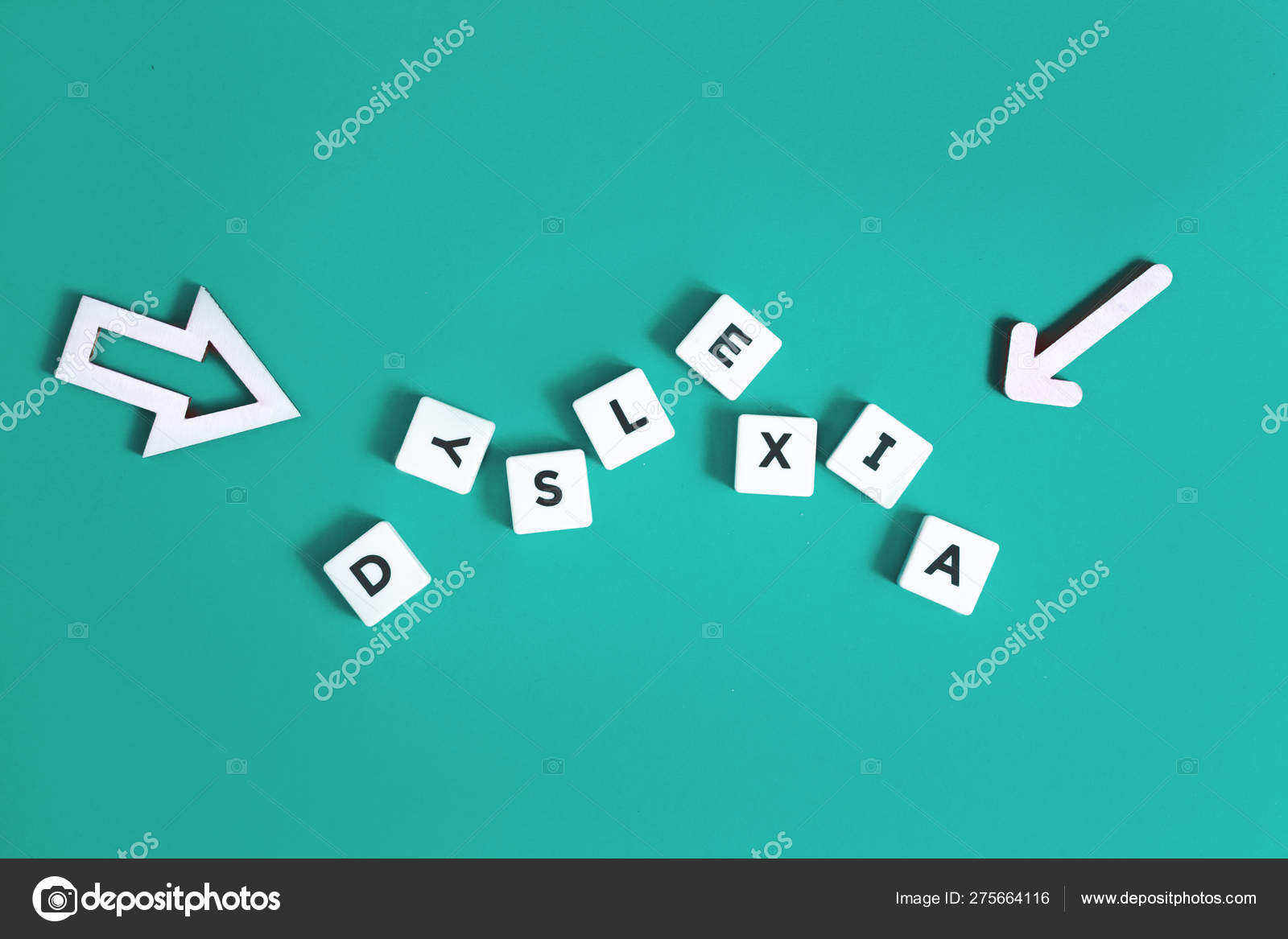 Dyslexia word and arrows on mint background — Stock Photo ...