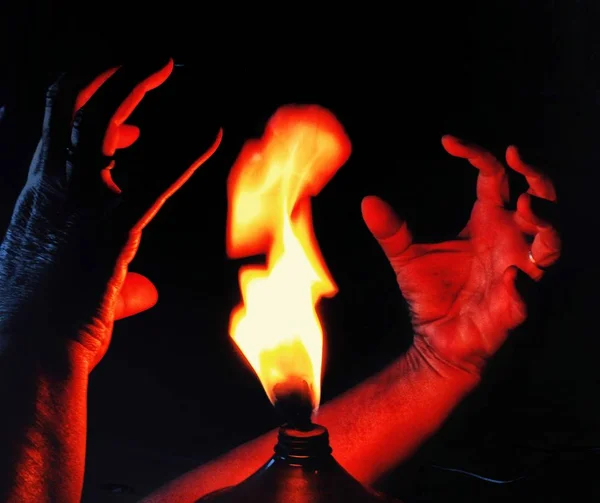 Man holding fire Stock Photos, Royalty Free Man holding fire Images ...