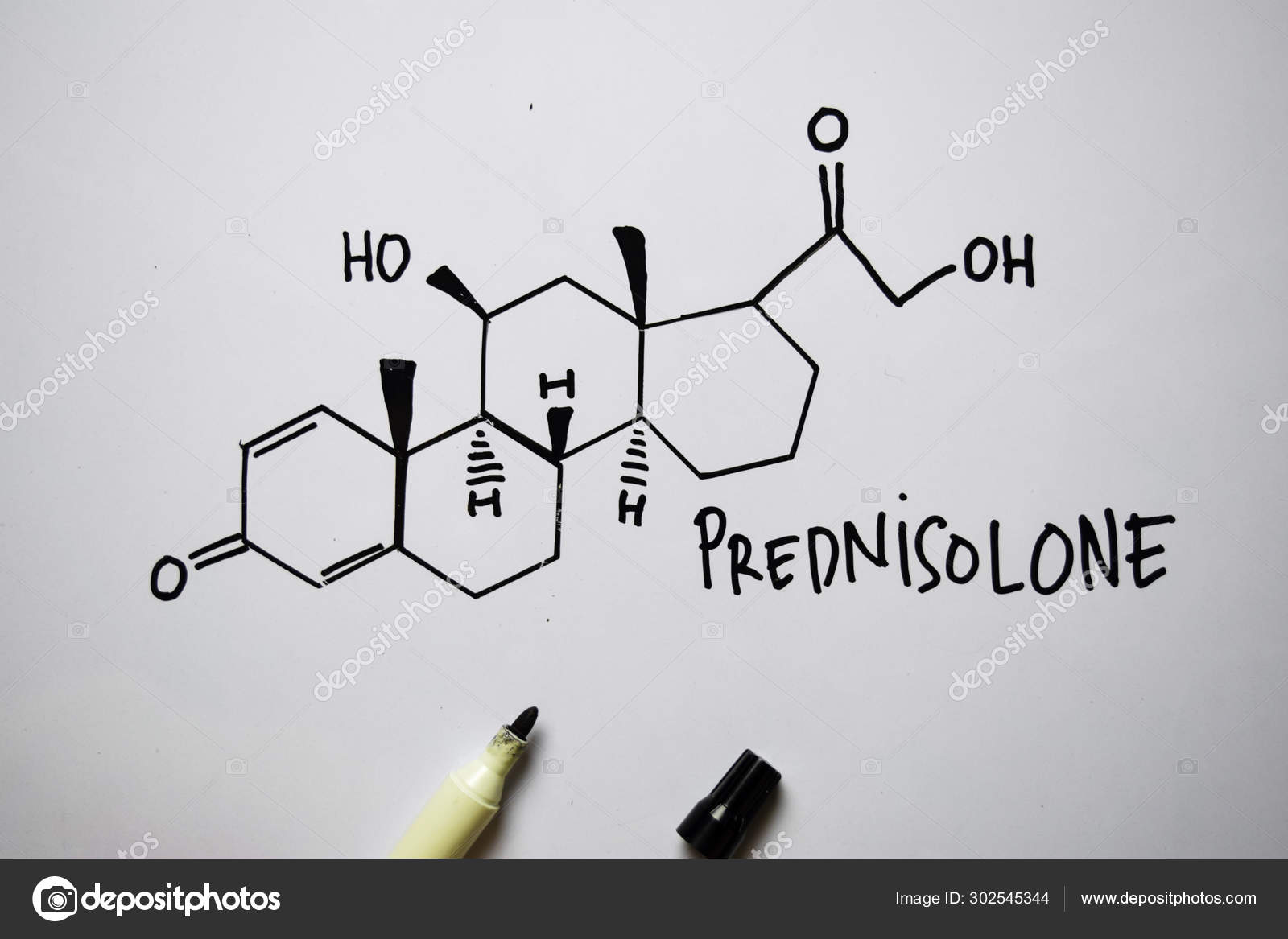 Prednisolone molecule written on the white board. Structural chemical ...