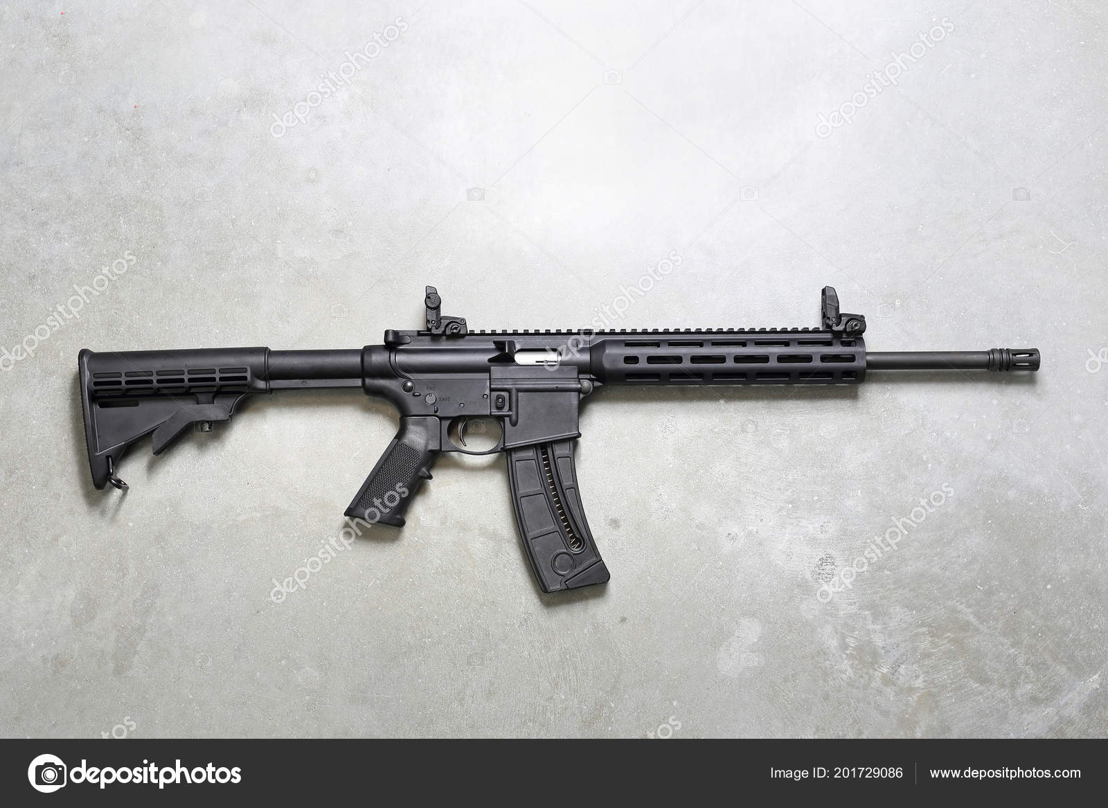 Weapon Rifle Gray Background Stock Photo by ©robertprzybysz 201729086