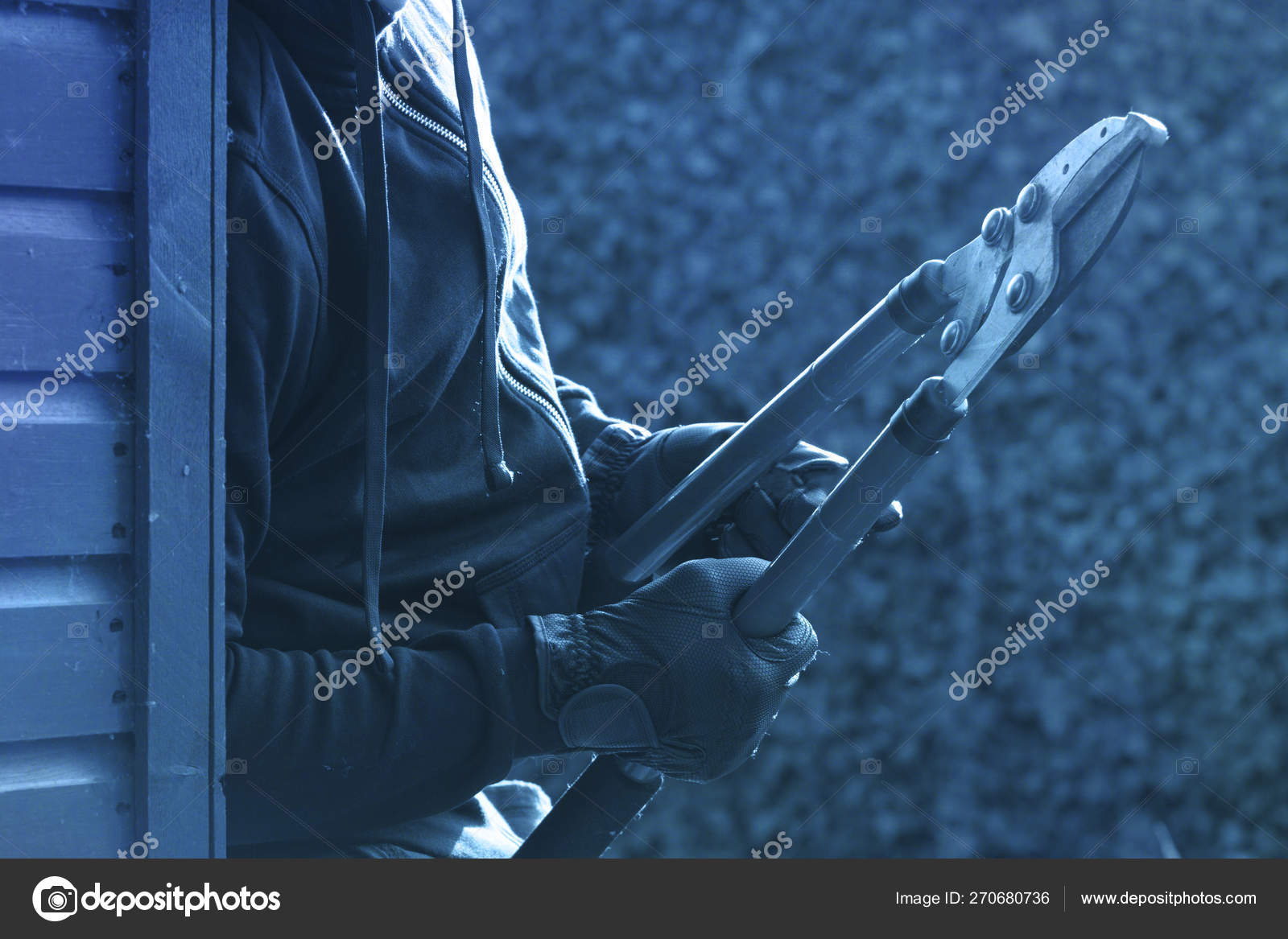 A burglar with a bolt cutter — Stock Photo © jensrother #270680736
