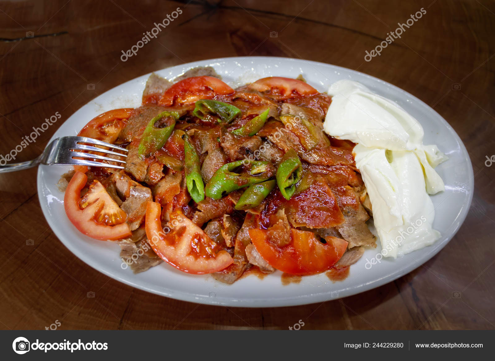 Traditional Turkish Iskender Kebab Stock Photo by ©Tminaz 244229280