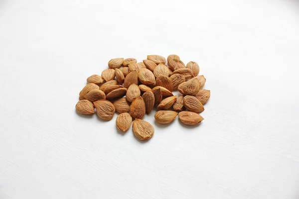 Almonds white background Stock Photos, Royalty Free Almonds white ...