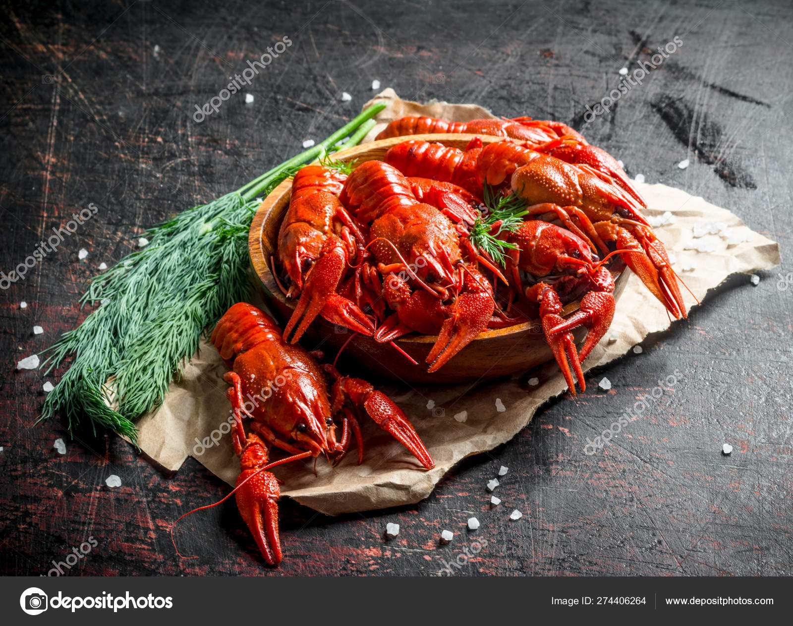 Boiled crayfish in a plate on paper with dill. Stock Photo by ©OlesySH ...