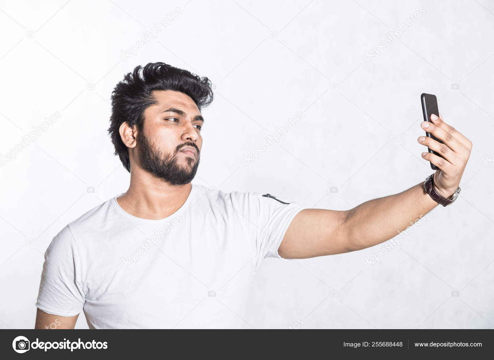 Young handsome man taking selfie on smartphone. — Stock Photo © Ufalab #255688448