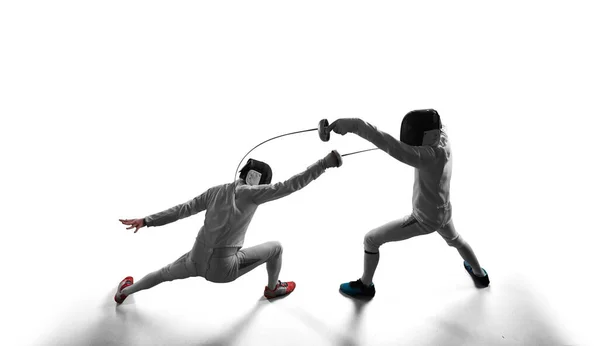 Two Young Men Fencing Stock Photo by ©arturdidyk@gmail.com 383633646