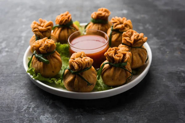 Crispy Potli Samosa or veg money bags are delicious Indian snacks of ...