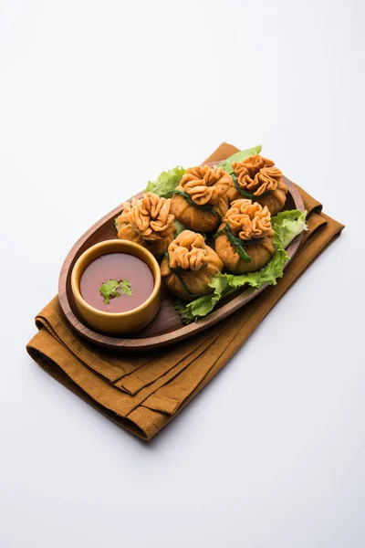 Crispy Potli Samosa or veg money bags are delicious Indian snacks of ...