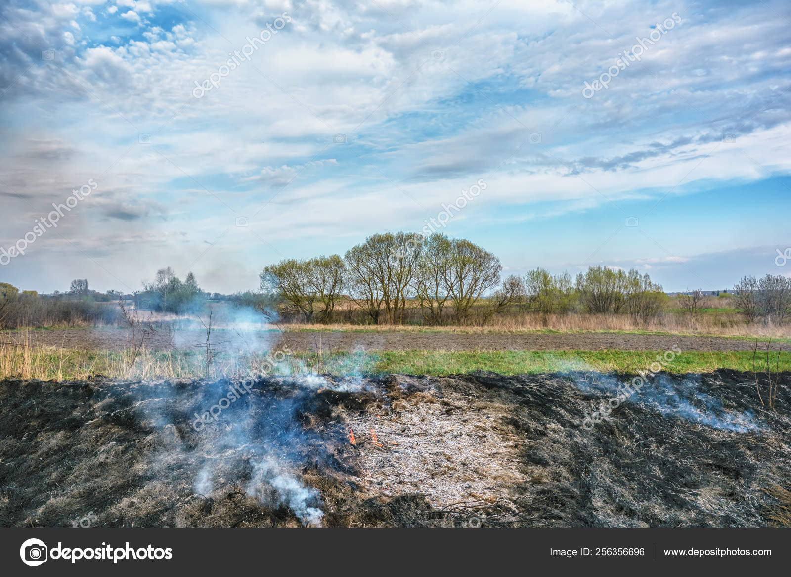 Fire Meadows Blue Sky Clouds Them Stock Photo by ©BIKTOP 256356696