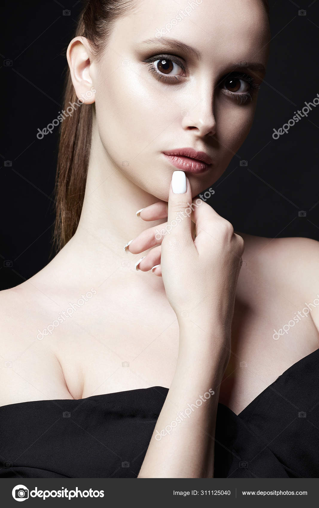 Pretty young woman over black background Stock Photo by ©EugenePartyzan ...