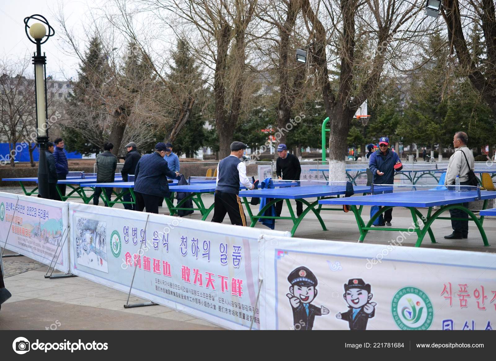 Chinese chaoxianzu men playing tabletennis pingpong, Tumen, Jilin ...