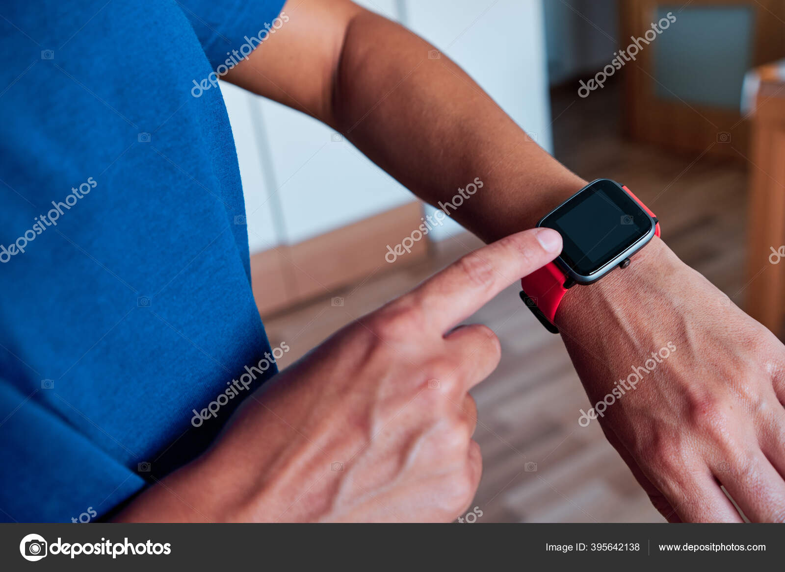 Woman arm using smartwatch to control activity indoor Stock Photo by ...