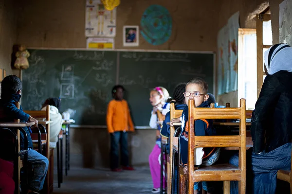 Inside the school with pupils and teacher in Khamila village, Morocco ...