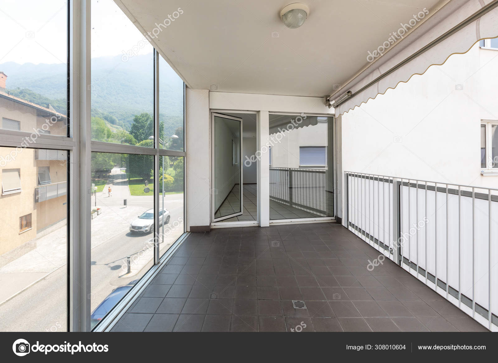 Covered terrace with large windows and views — Stock Photo © Zveiger ...