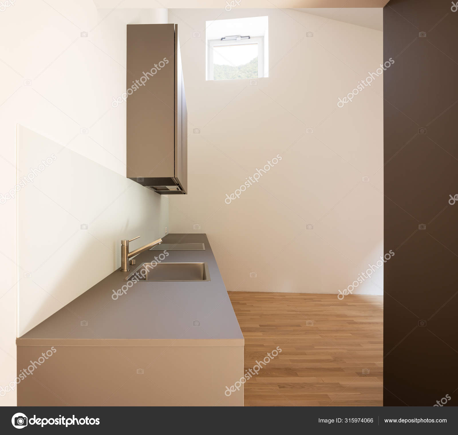 Front view of modern kitchen with washbasin and window overlooki Stock ...
