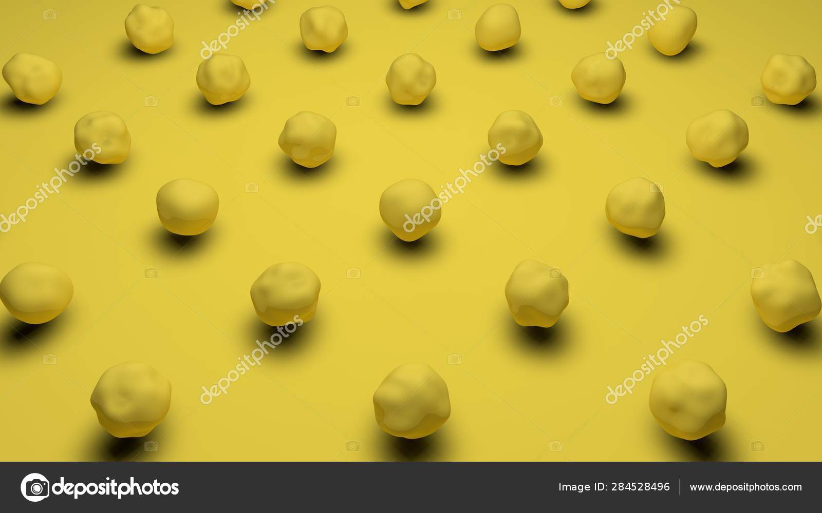 3D rendering of a set of spherical objects of yellow color with a wavy ...