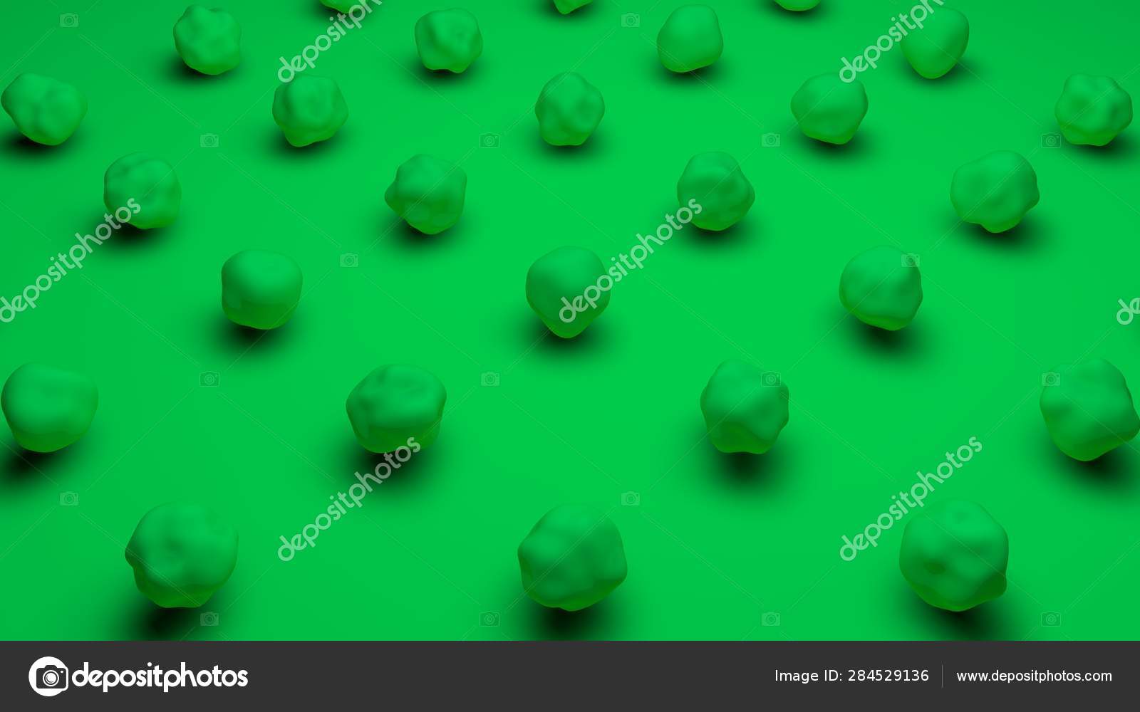 3D rendering of a set of green spherical objects with a wavy surface on ...