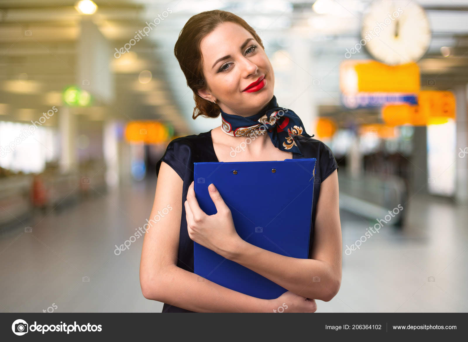 Pretty Stewardess Folder Airport Stock Photo by ©luismolinero 206364102