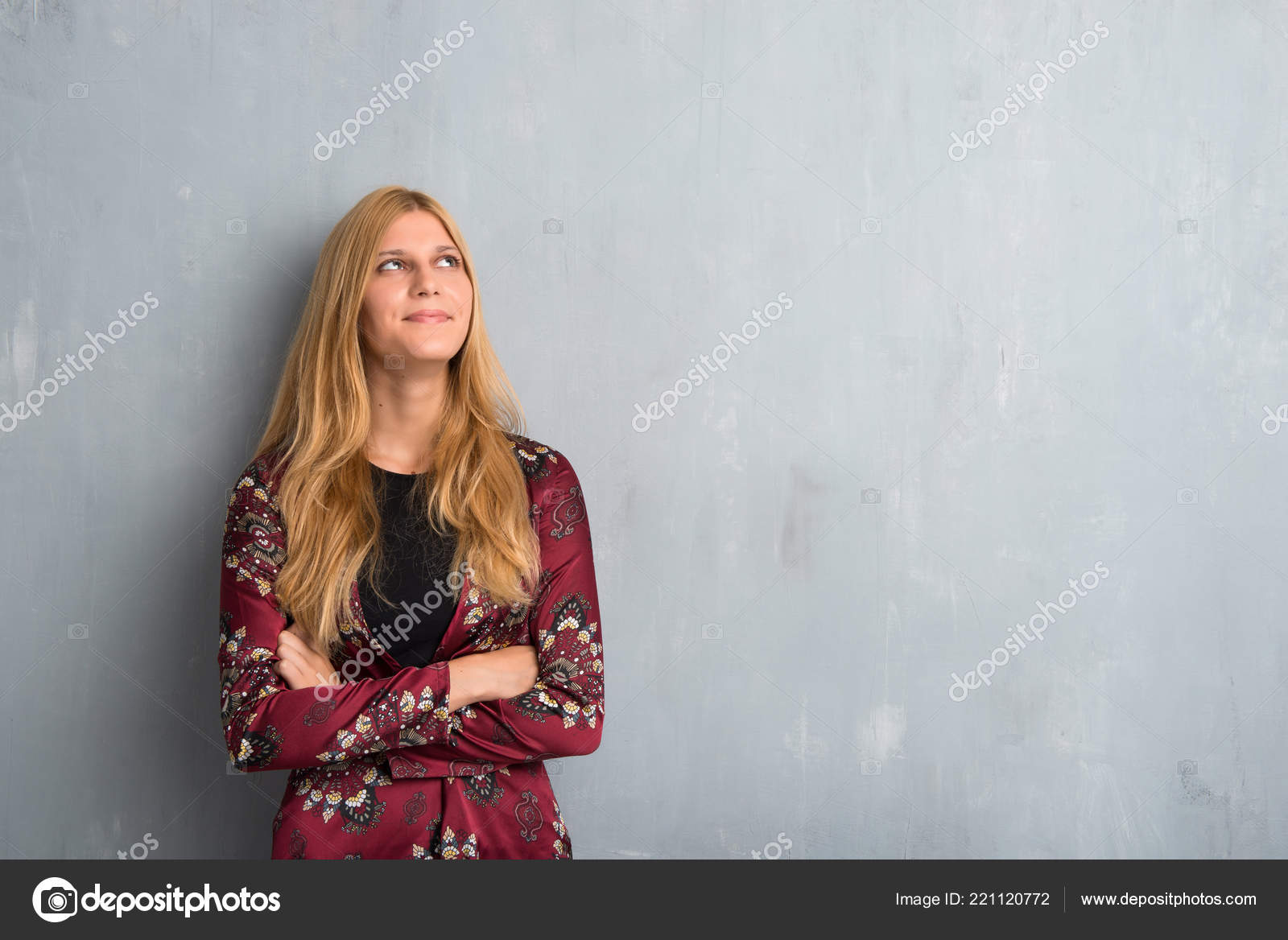 Blonde Woman Stand Looking While Smiling Textured Wall Background ...