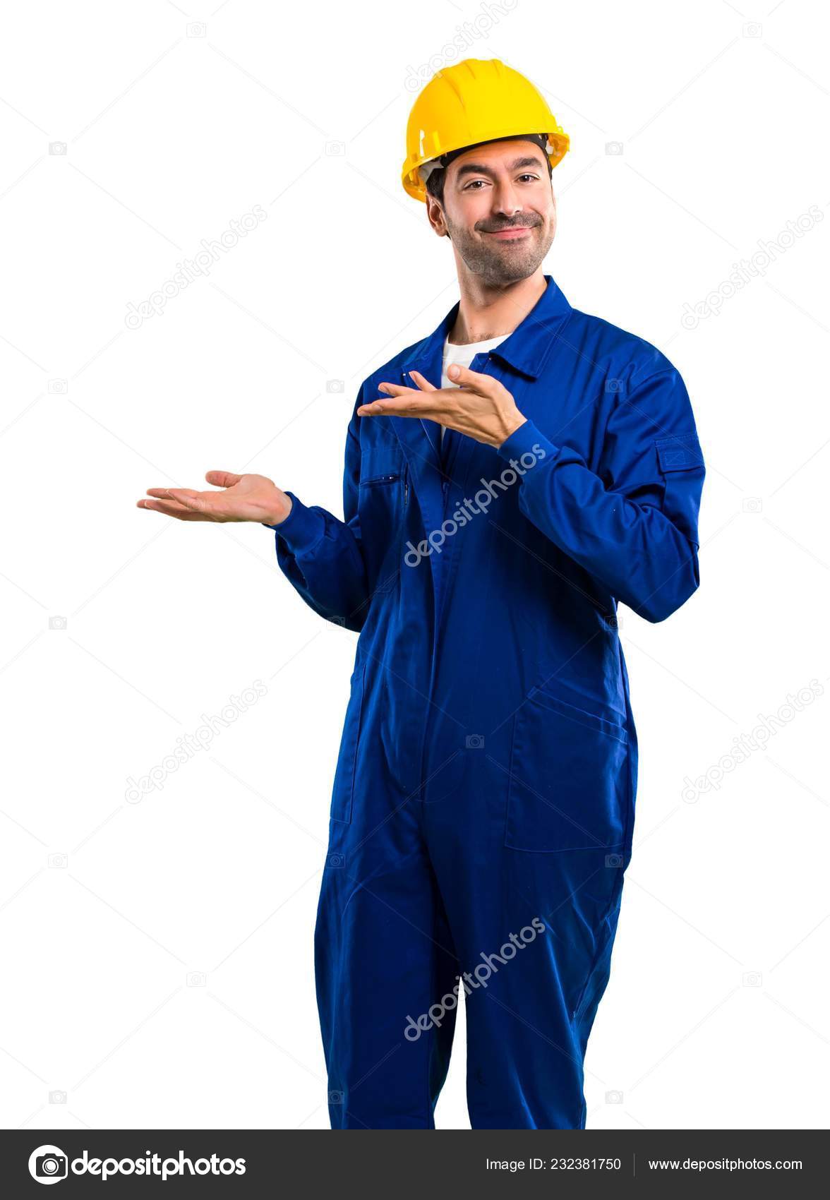 Young Workman Helmet Extending Hands Side Smiling Presenting Inviting ...