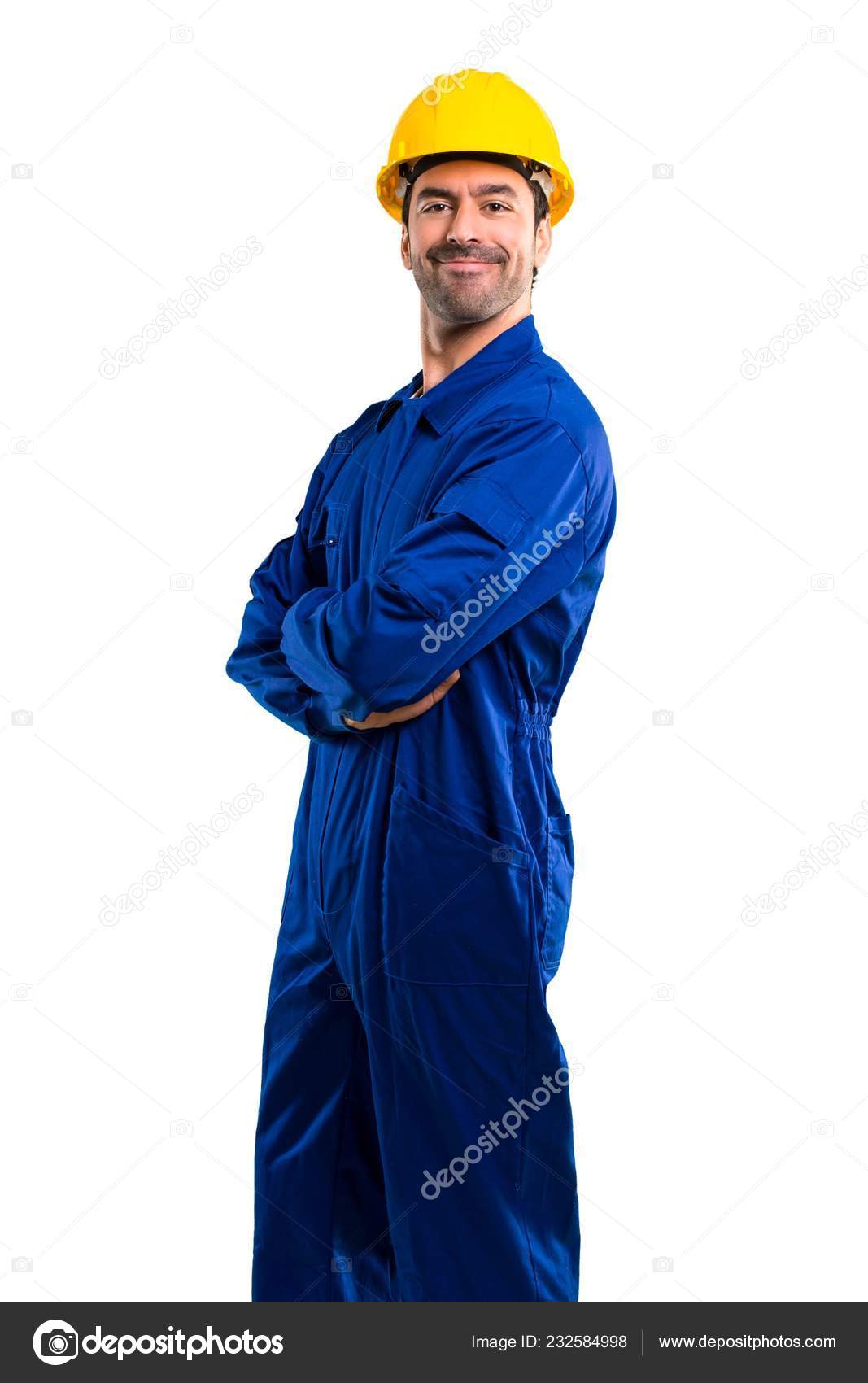 Young Workman Helmet Keeping Arms Crossed Lateral Position While ...