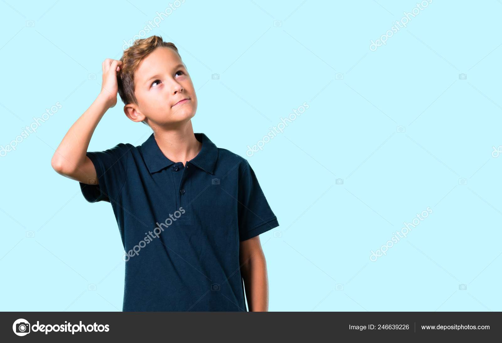 Little Boy Standing Thinking Idea Blue Background Stock Photo by ...