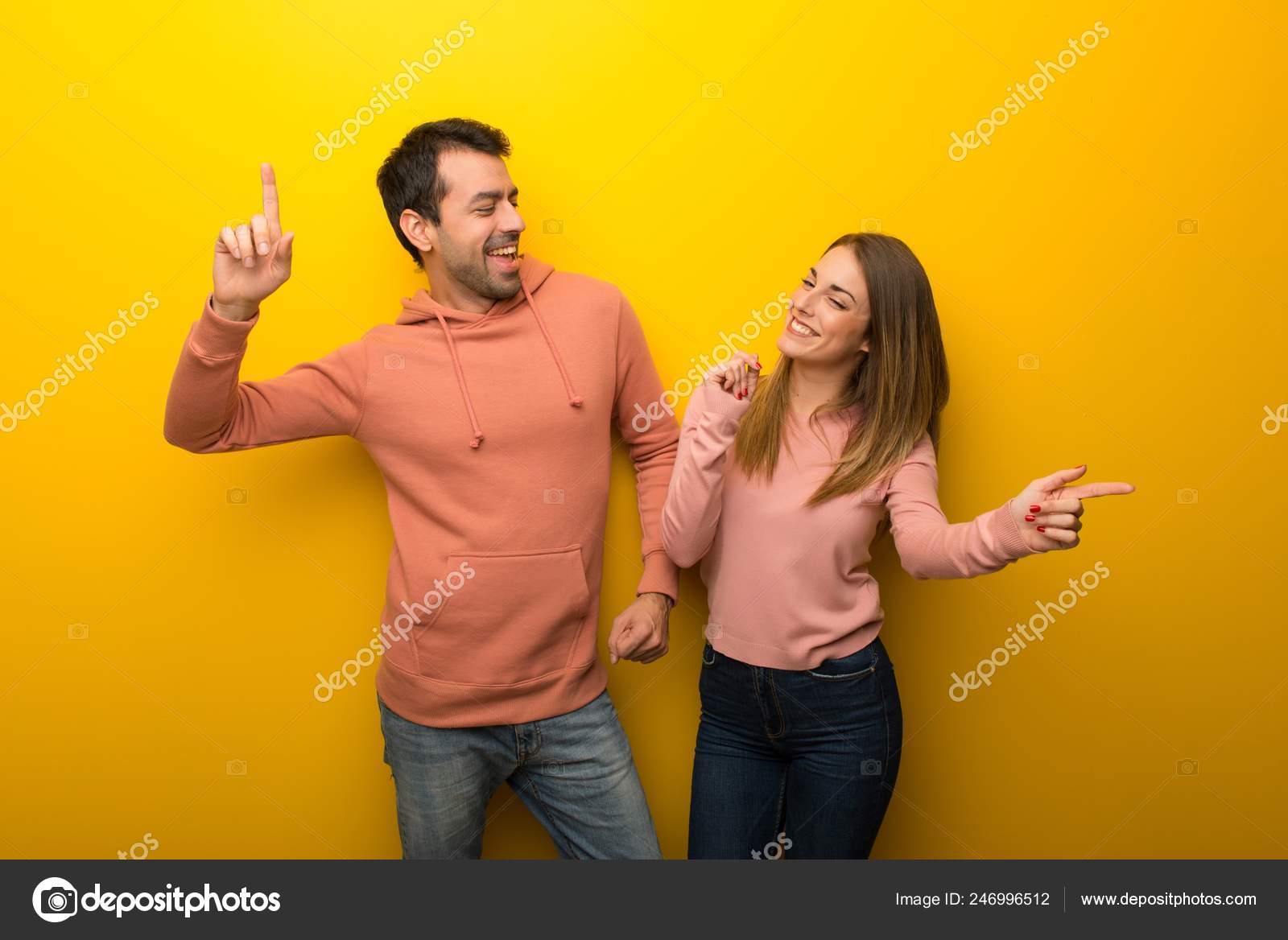 Group Two People Yellow Background Enjoy Dancing While Listening Music ...