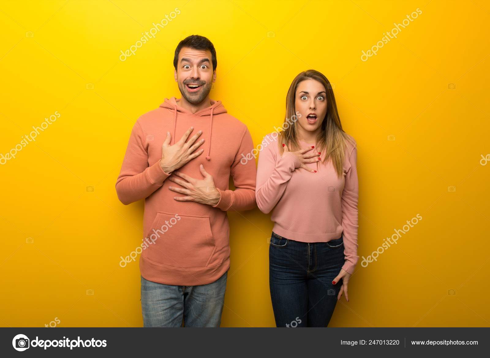 Group Two People Yellow Background Surprised Shocked While Looking ...