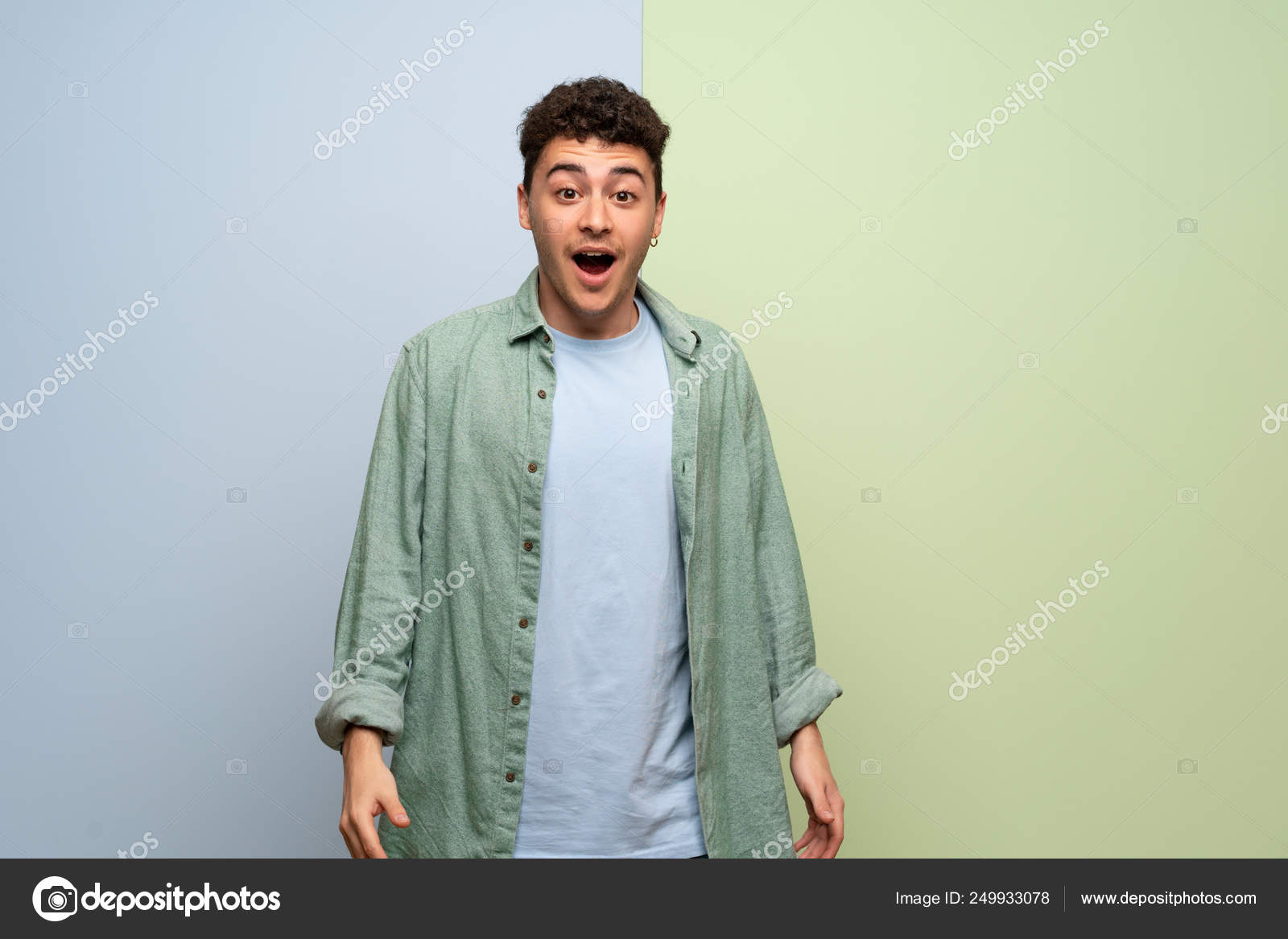 Young Man Blue Green Background Surprise Shocked Facial Expression ...